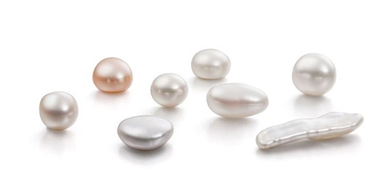 Decoding the Contrast: Unraveling Natural vs. Cultured Pearls